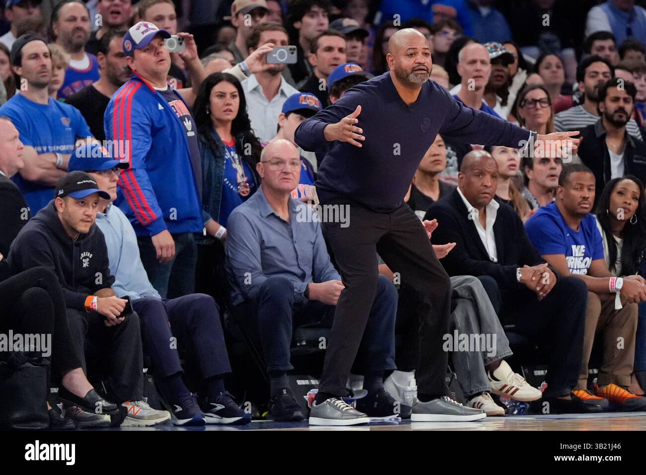 Detroit Pistons head coach Dwane Casey reacts on the sideline during ...