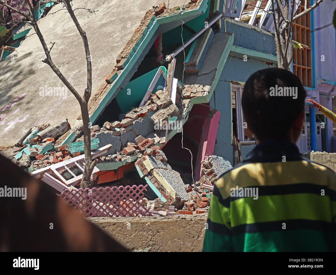April 26, 2025, Srinagar, Jammu And Kashmir, India: A boy looks towards ...