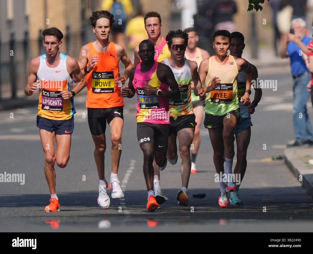 Men's elite runners, including Alex Yee, reach the Isle of Dogs, during the TCS London Marathon ...