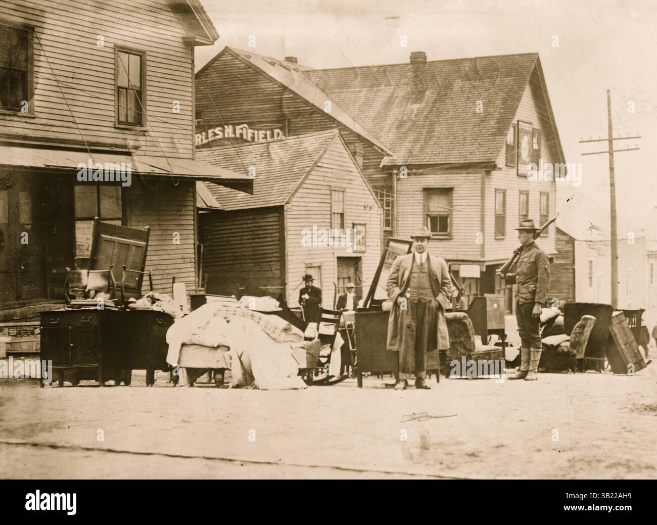 May 05, 1911 - Bangor, Maine, U.S. - Soldier guarding household effects ...