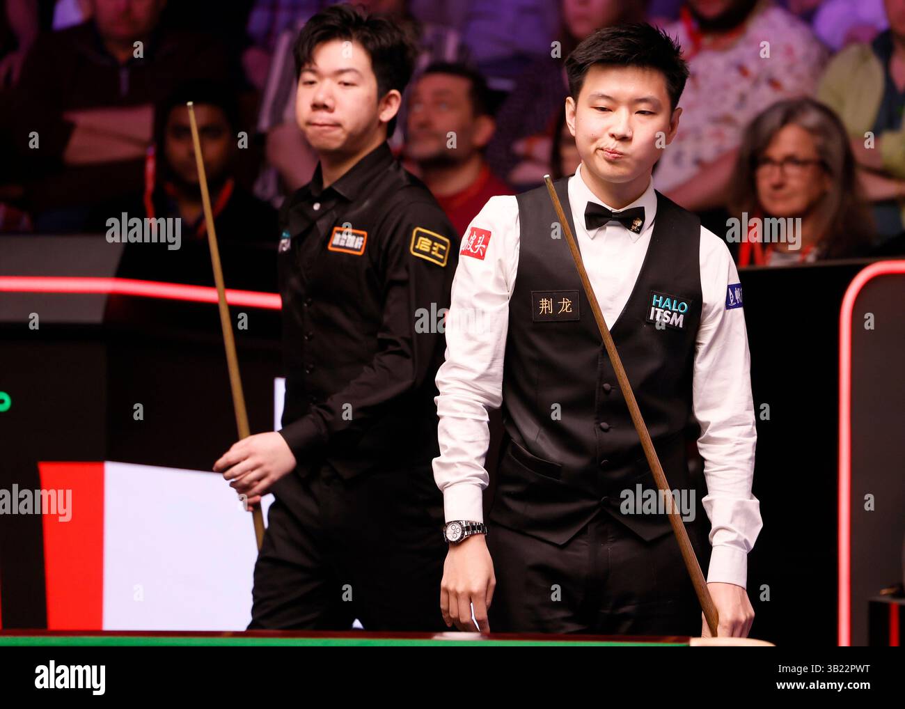 Zhao Xintong (right) during his match against Lei Peifan (left) during ...