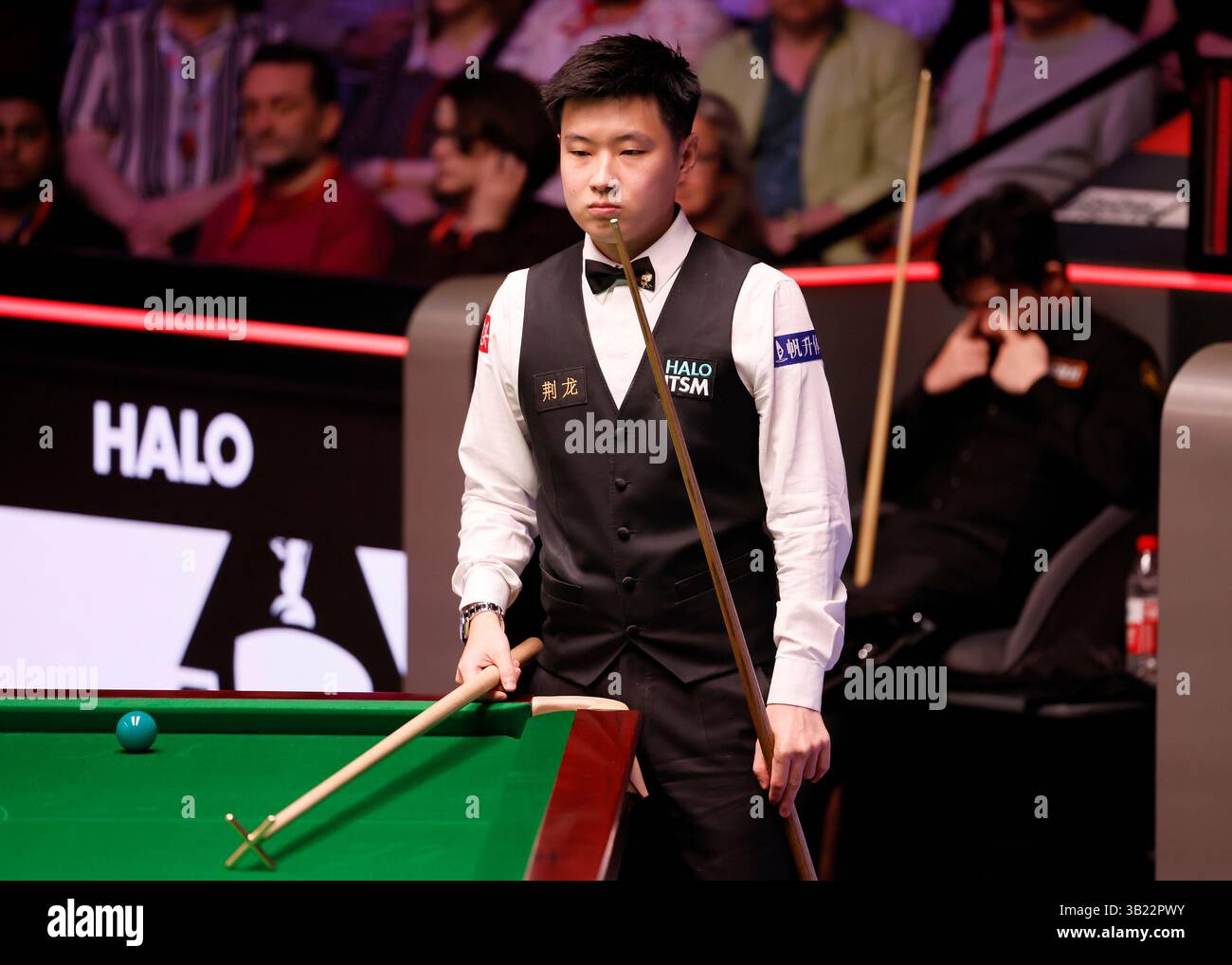 Zhao Xintong (left) during his match against Lei Peifan (right) during ...
