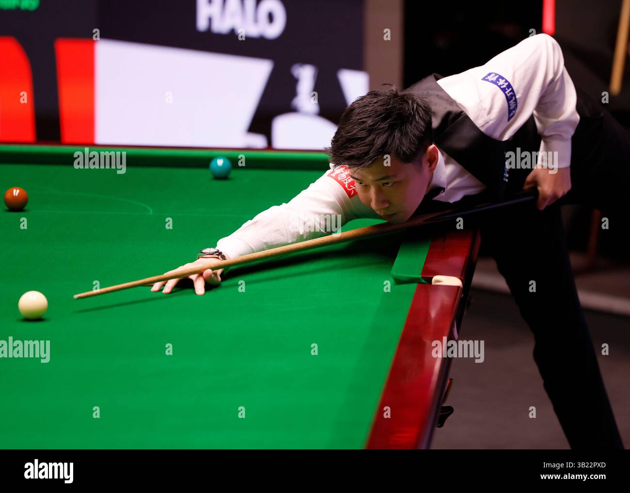 Zhao Xintong during his match against Lei Peifan (not pictured) during ...