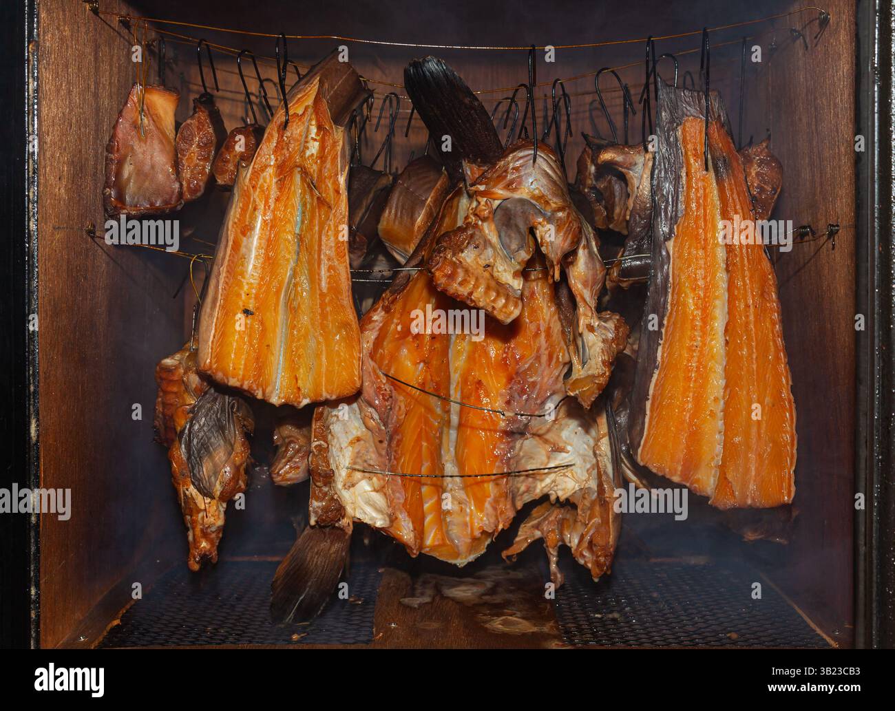 Smoked fish smoking hi-res stock photography and images - Alamy