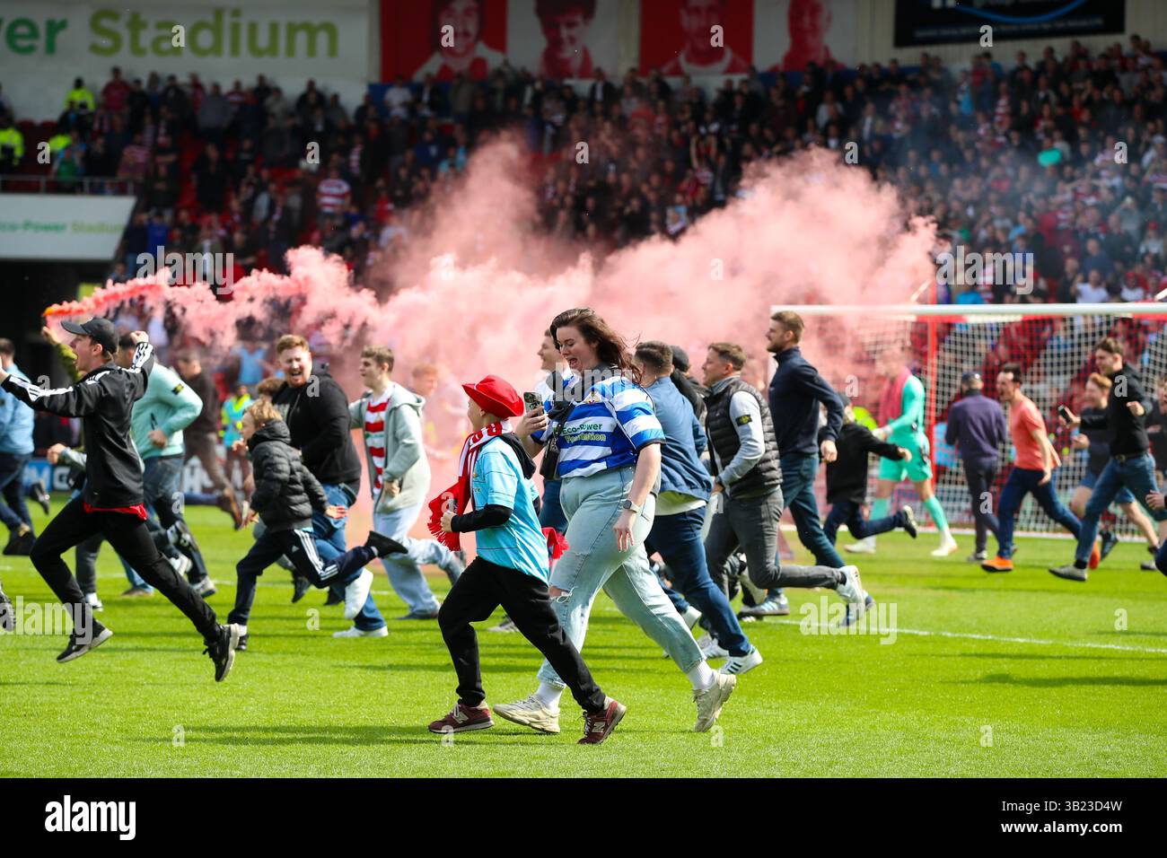 Eco - Power Stadium, Doncaster, England - 26th April 2025 Doncaster Rovers fans invade the pitch ...