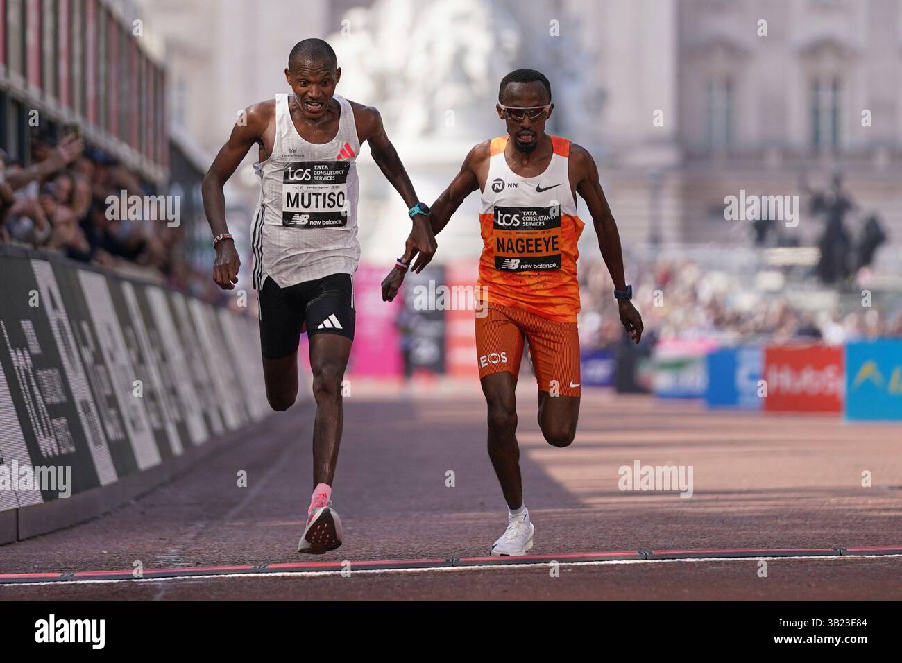 Alexander Mutiso of Kenya, left,crosses the line to place third just ...