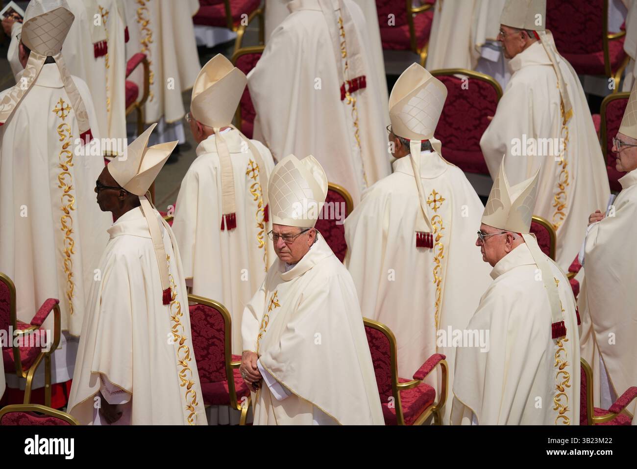 Cardinals leave after a mass presided over by Vatican Secretary of ...