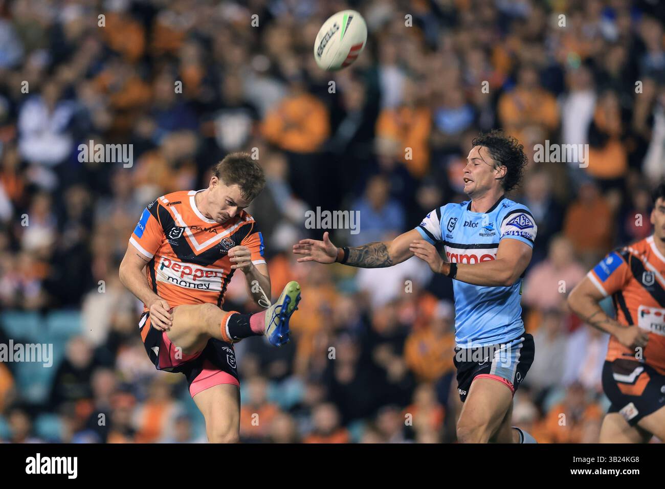 Sydney, Australia. 27th Apr, 2025. Lachlan Galvin of the Tigers gets a ...