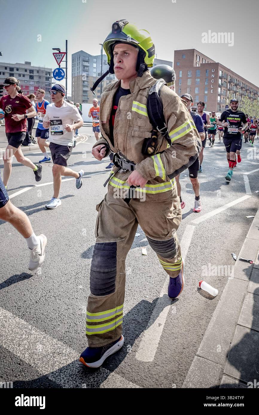 London, UK. 27th April, 2025. Firefighter is seen as London Marathon ...