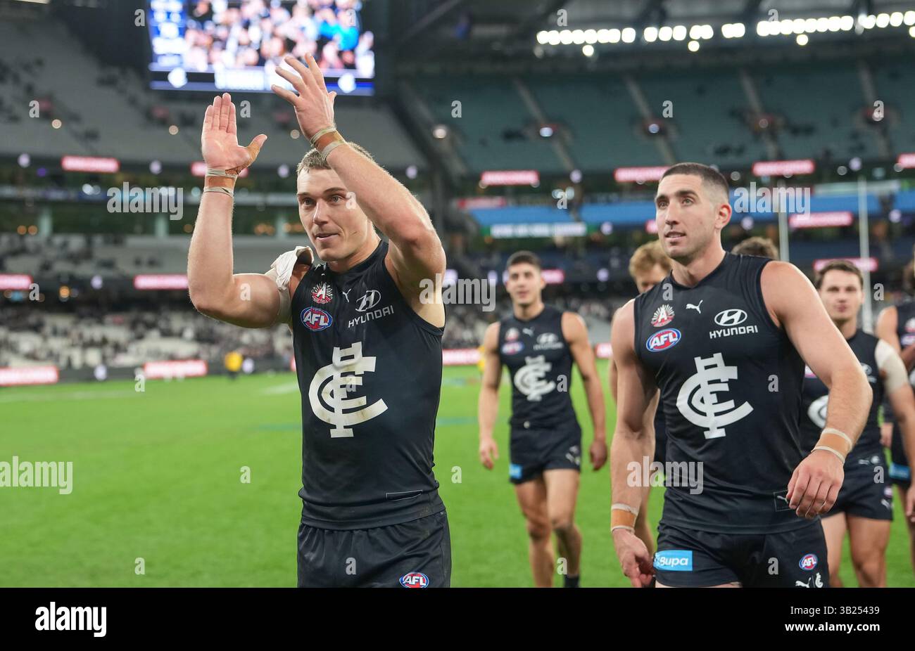 Melbourne, Australia. 27th Apr, 2025. Patrick Cripps and Jacob Weitering of the Blues lead their ...