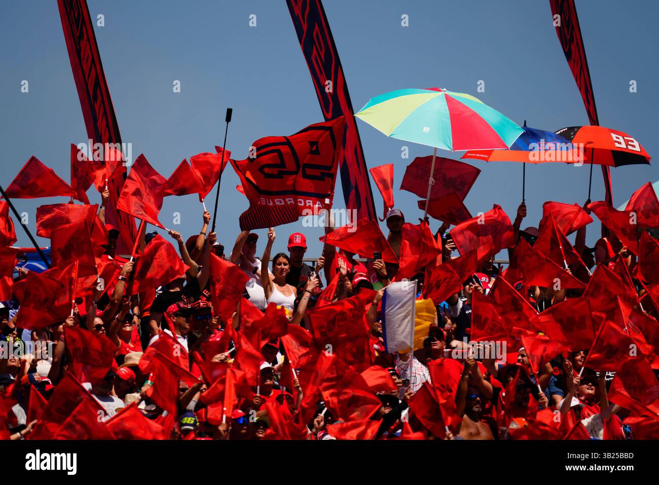 Fans of Spain's rider Marc Marquez of the Ducati Lenovo Team cheer ...