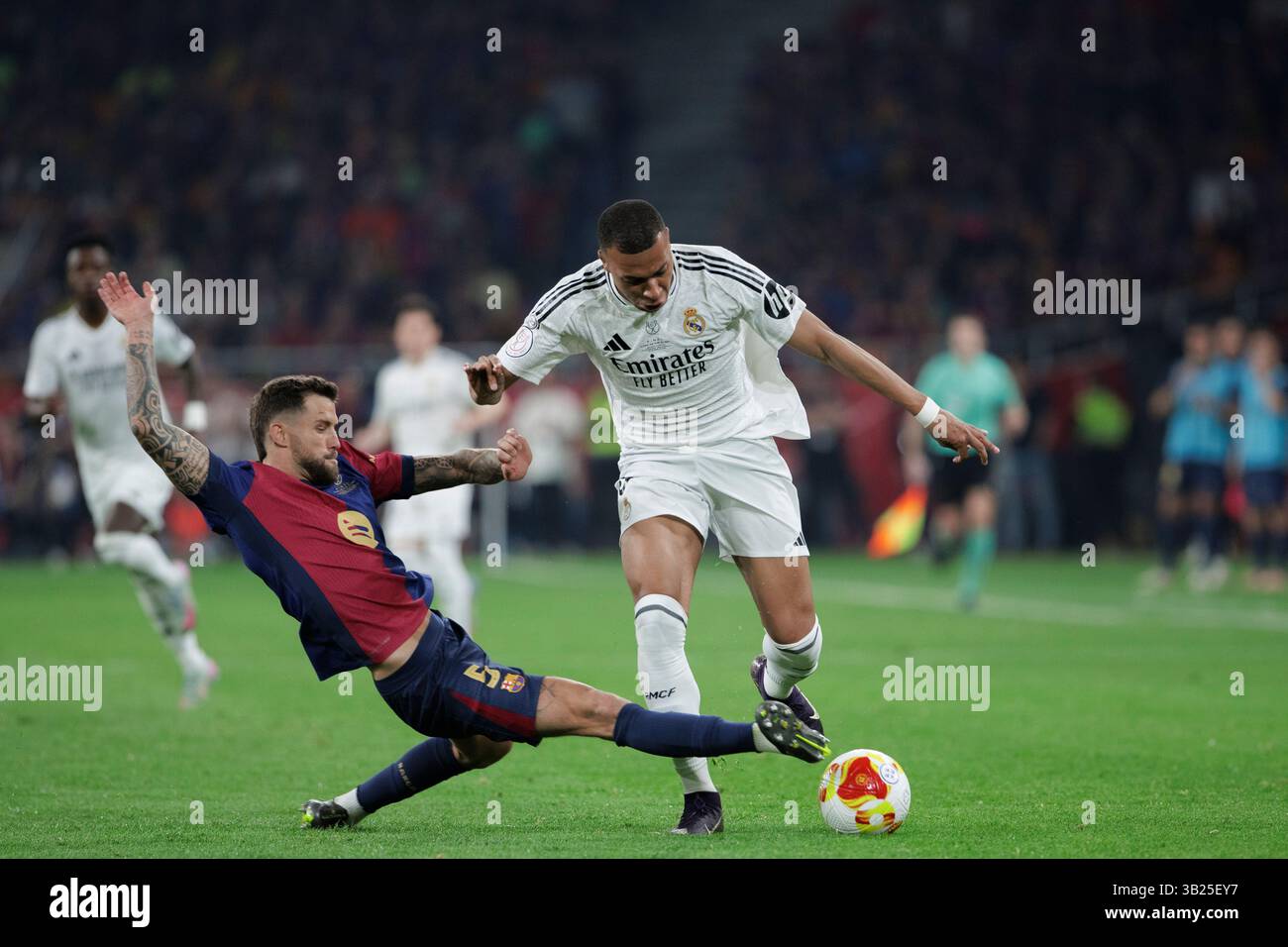 SEVILLA, SPAIN - April 26:Kylian Mbappe of Real Madrid and Igo Martinez ...
