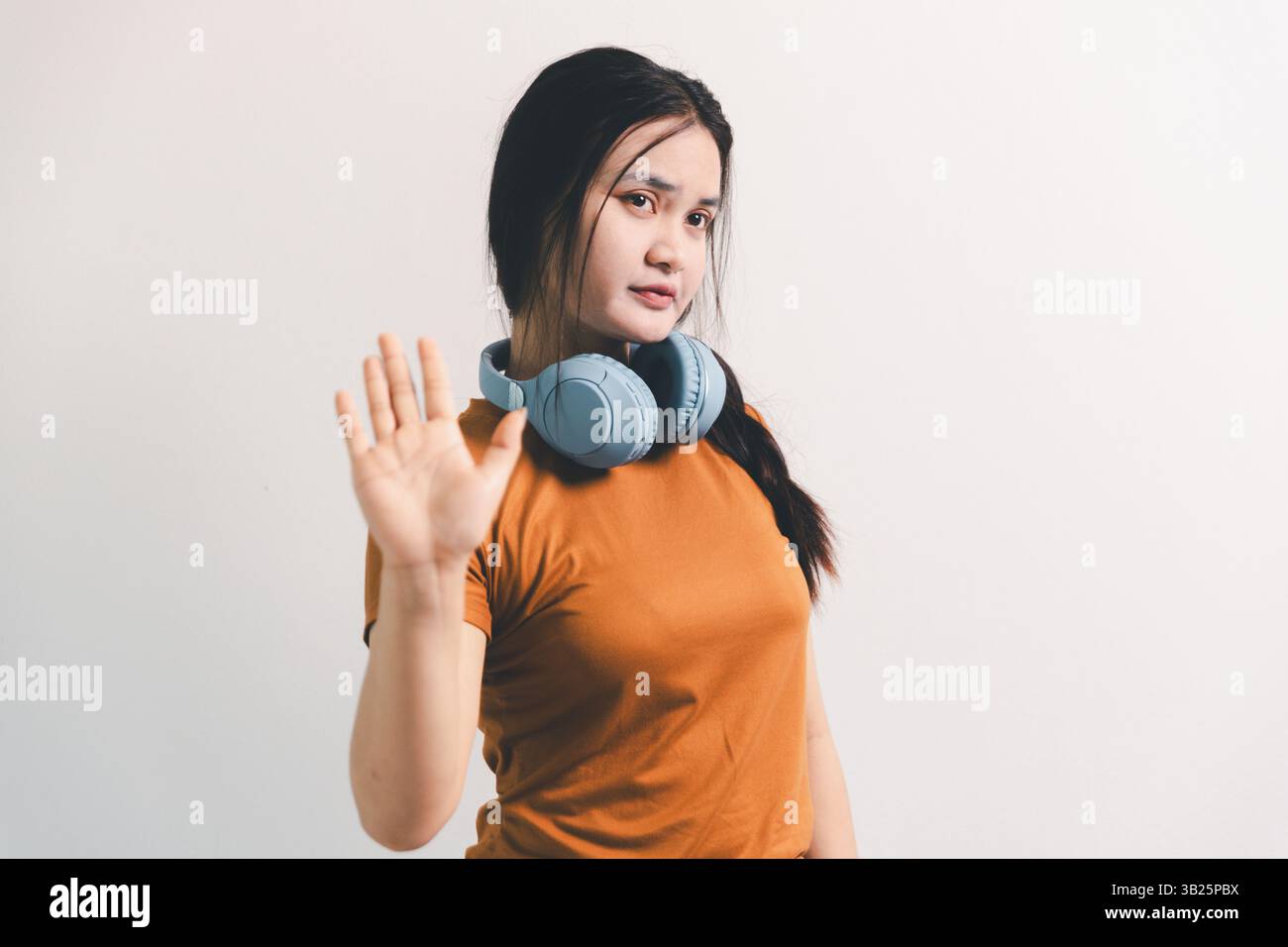 Asian girl expresses dislike, person express negative feeling, concept ...