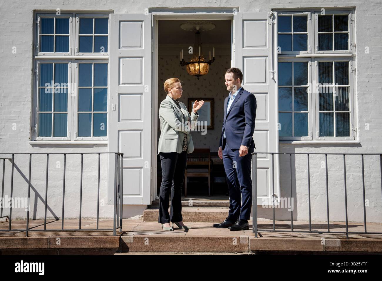 Denmark's Prime Minister Mette Frederiksen, left, and Greenland's Prime ...