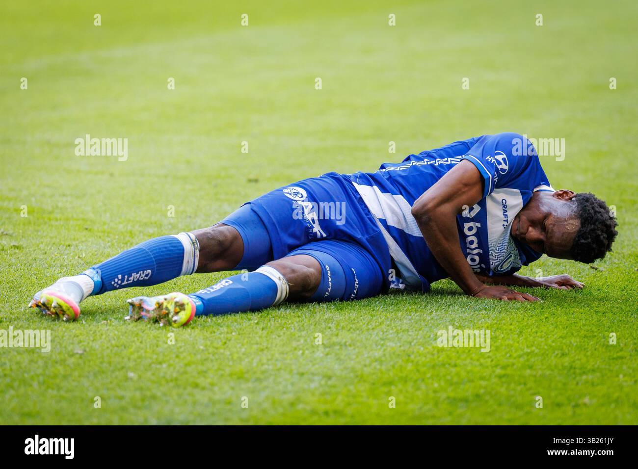 Gent, Belgium. 27th Apr, 2025. Gent's Hyllarion Goore lies injured on ...