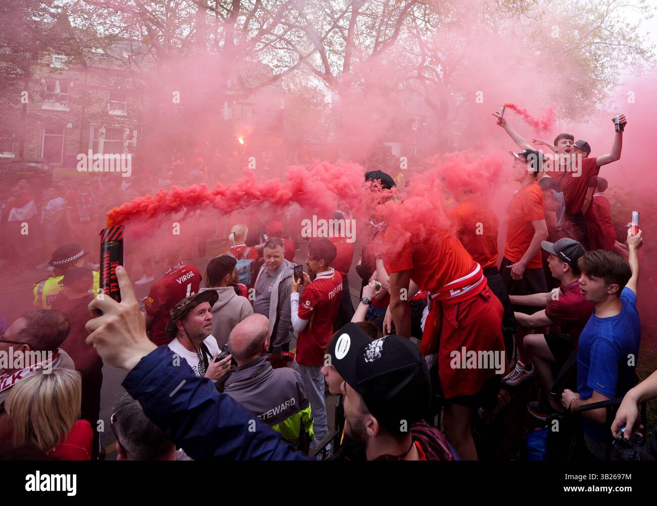 Liverpool fans set off flares outside the ground ahead of the Premier ...
