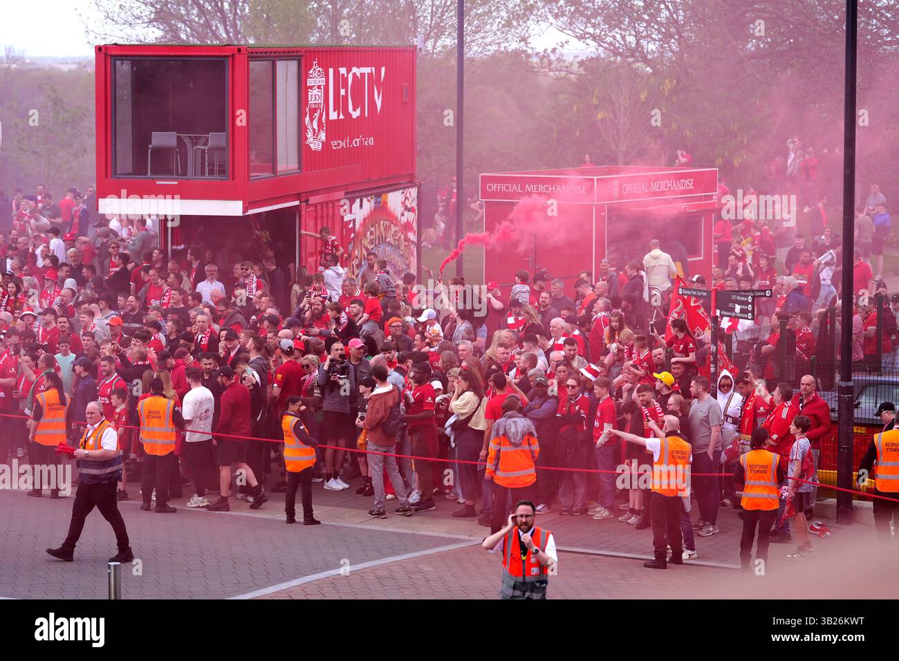 Liverpool fans set off flares outside the ground ahead of the Premier ...
