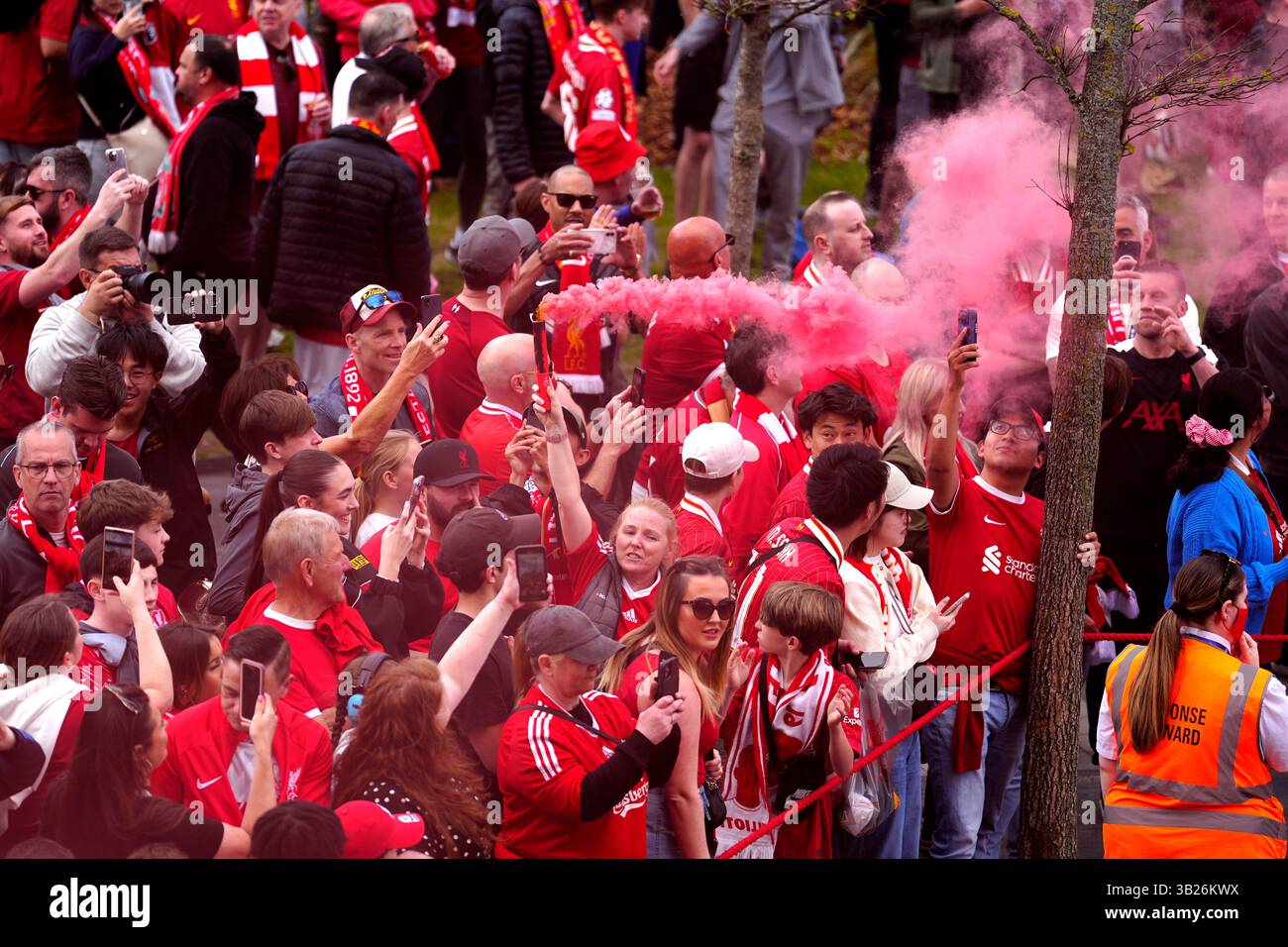 Liverpool fans set off flares outside the ground ahead of the Premier ...