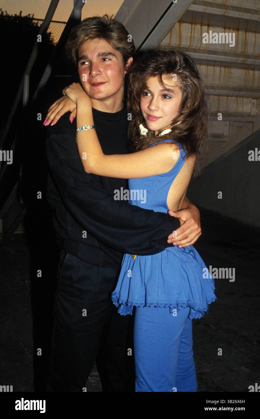 COREY FELDMAN WITH ALYSSA MILANO 1987.PHOTO BY BETTY MICKELSON ...