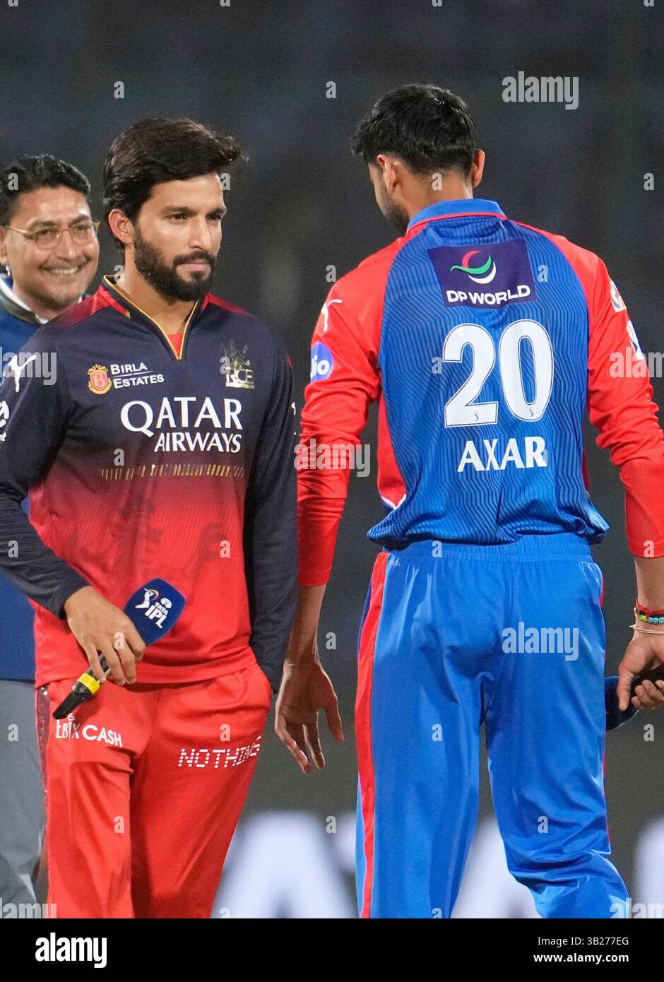 Royal Challengers Bengaluru's captain Rajat Patidar, left, and Delhi ...