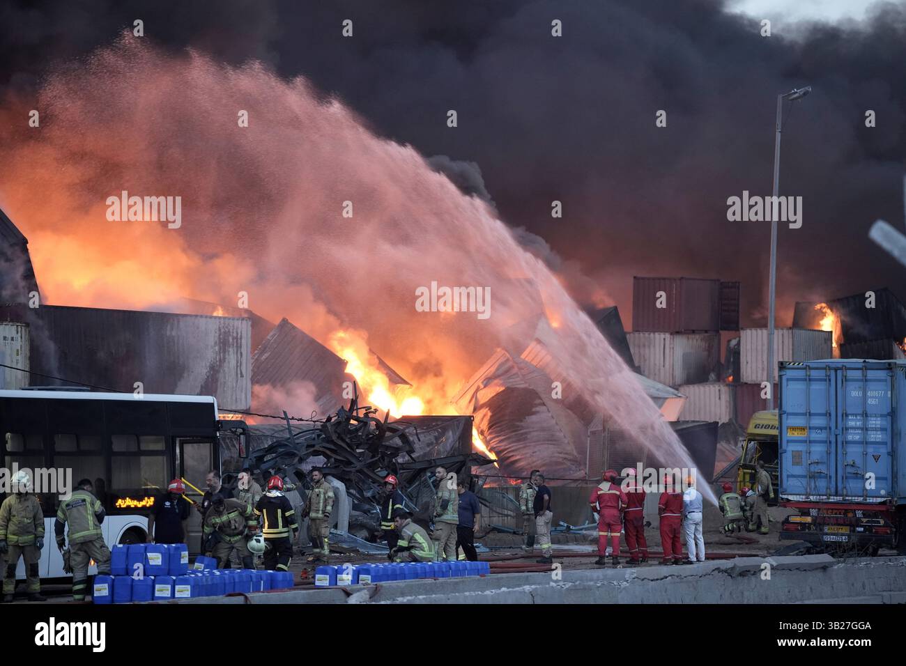 Firefighters try to extinguish the fire, Sunday, April 27, 2025, after ...