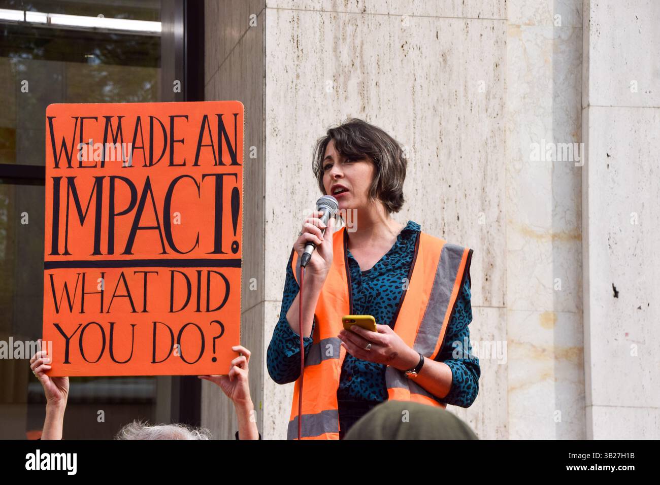 London, UK. 26th April 2025. Activist Chloe Naldrett speaks outside ...