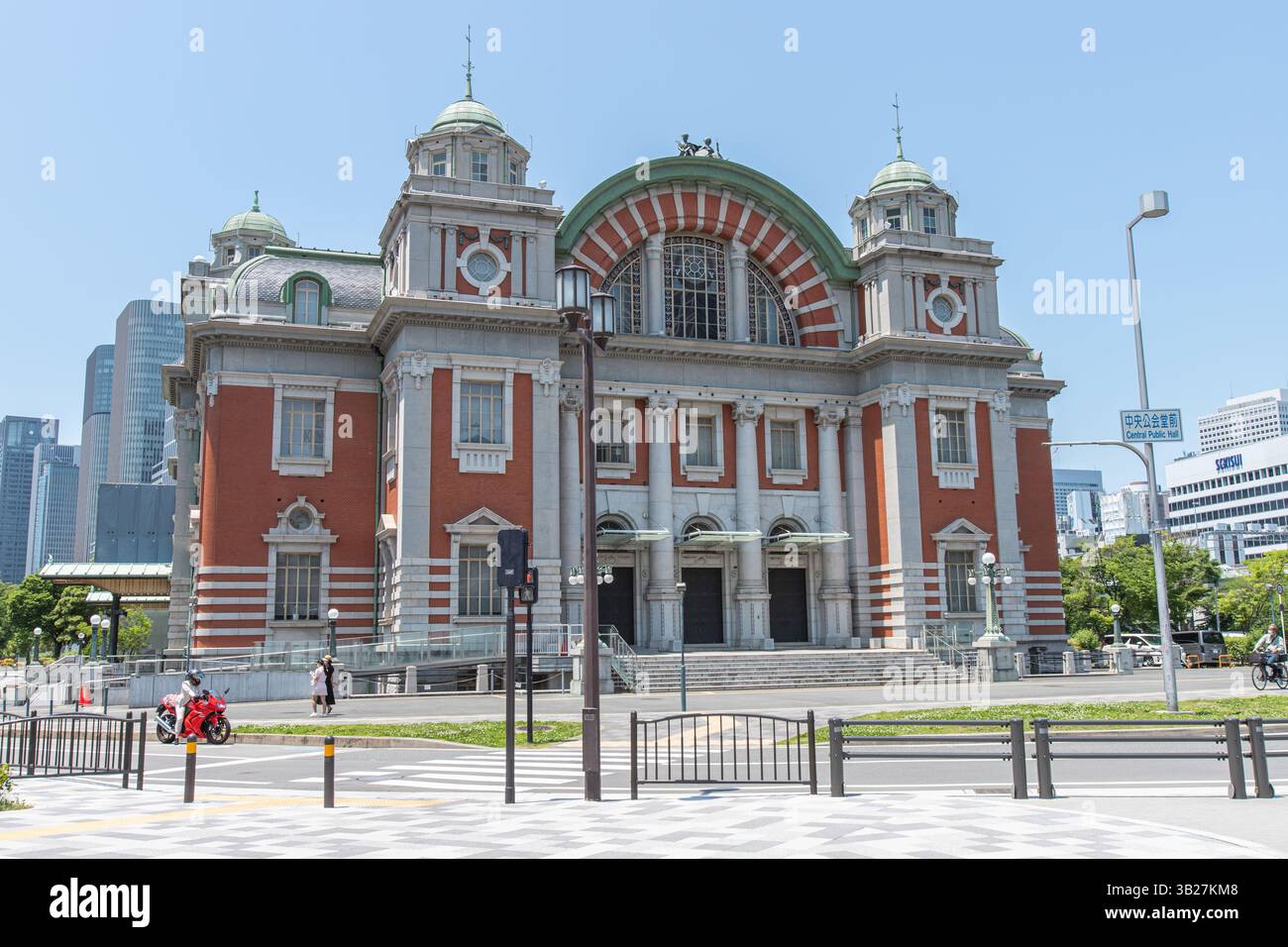 Wide view of Osaka Central Public Hall from across the street, showing ...