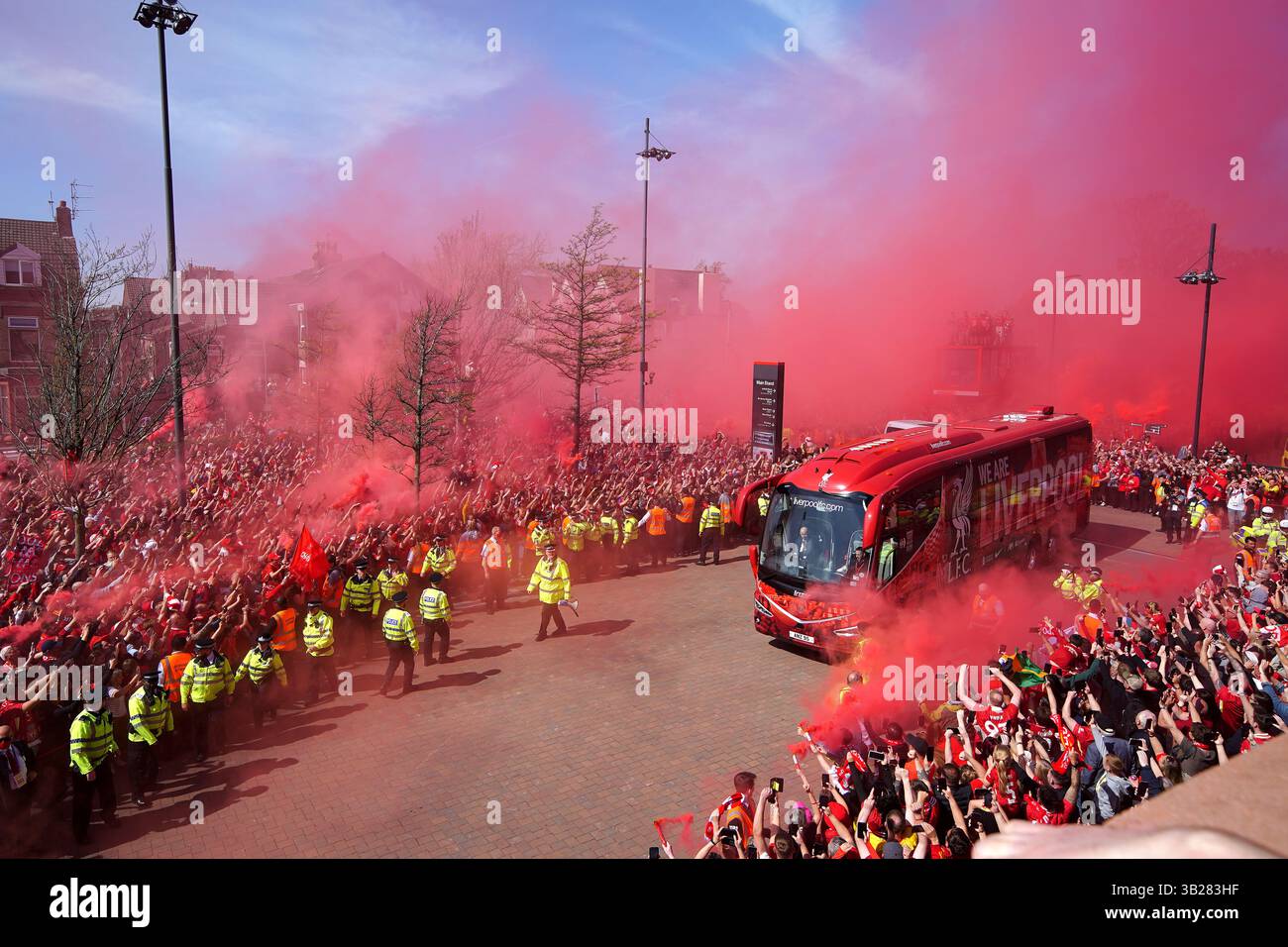 A general view as fans react to the Liverpool team coach arriving ahead ...