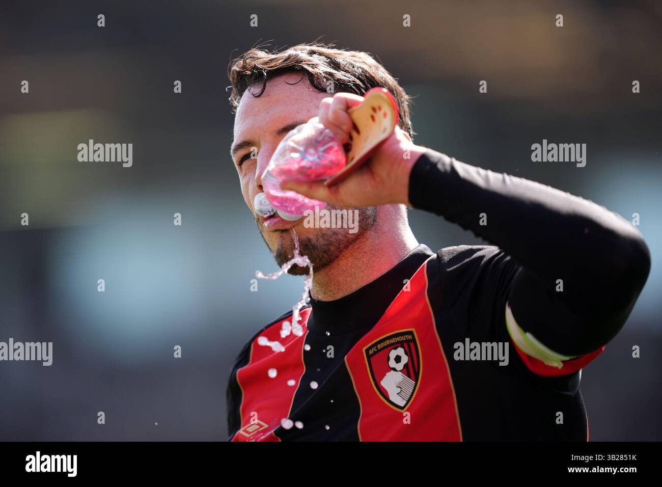 Bournemouth's Adam Smith takes a drink during the Premier League match ...