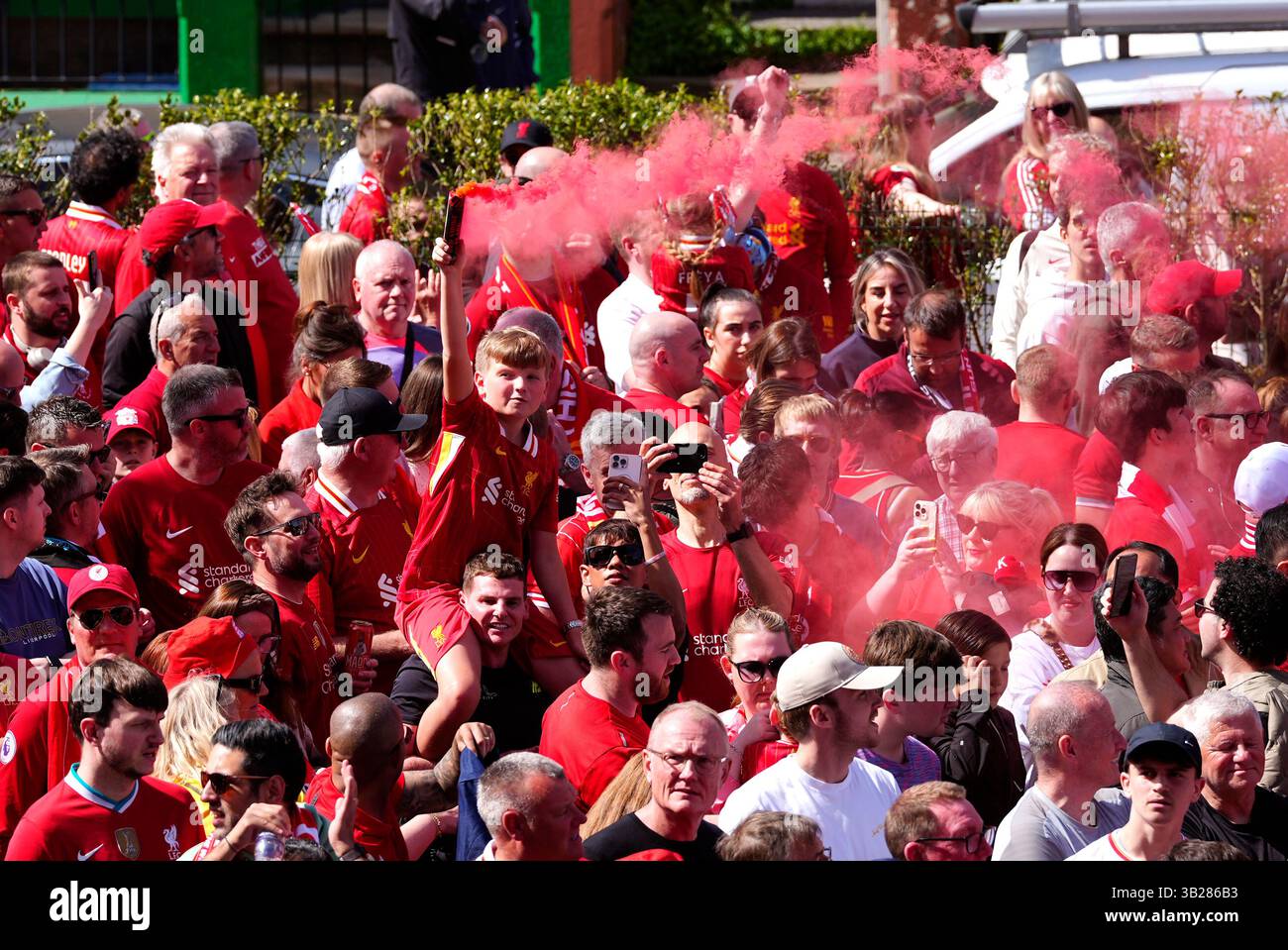 Liverpool fans set off flares outside the stadium ahead of the Premier ...