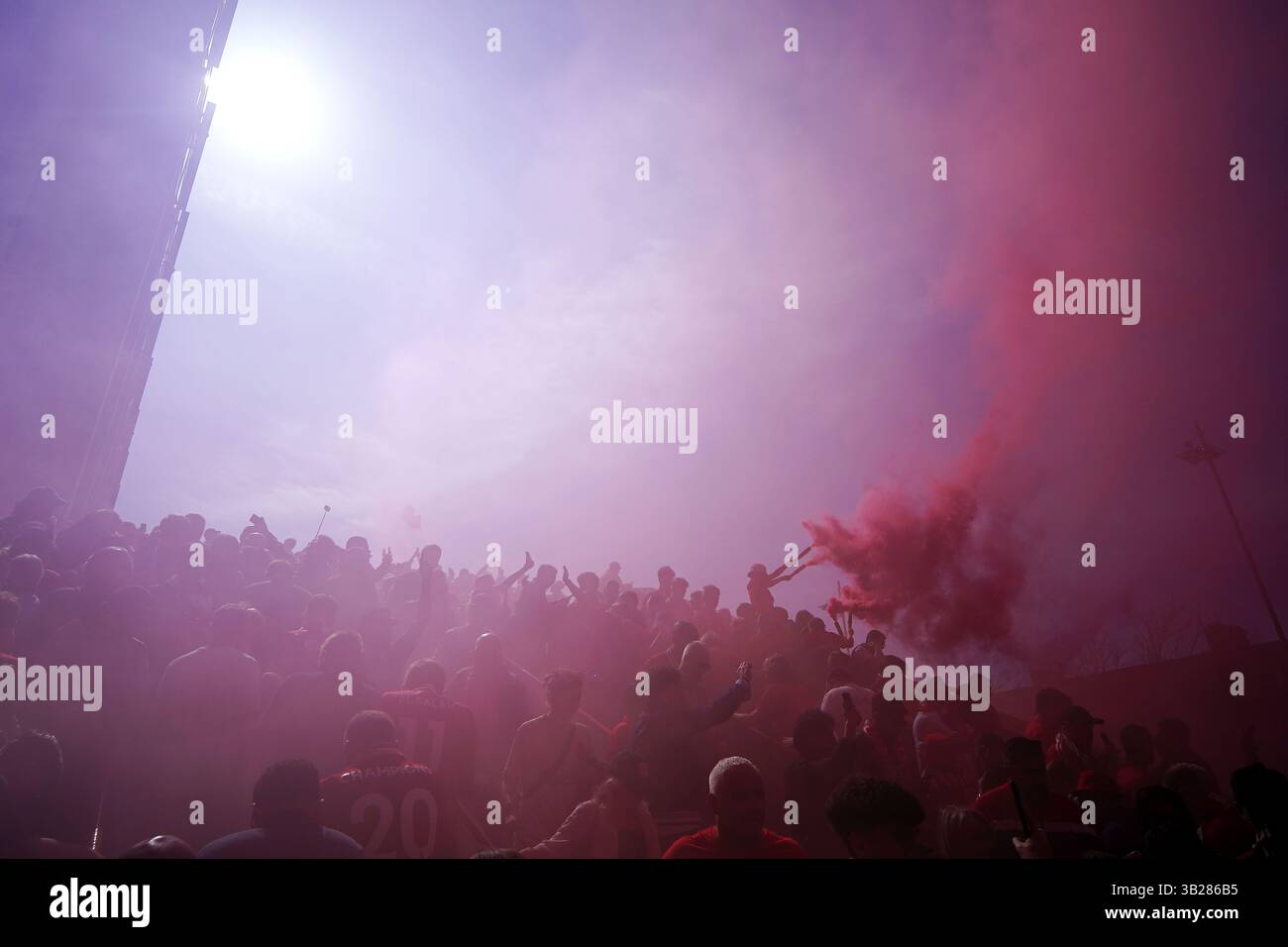 Liverpool fans set off flares outside the stadium ahead of the Premier ...