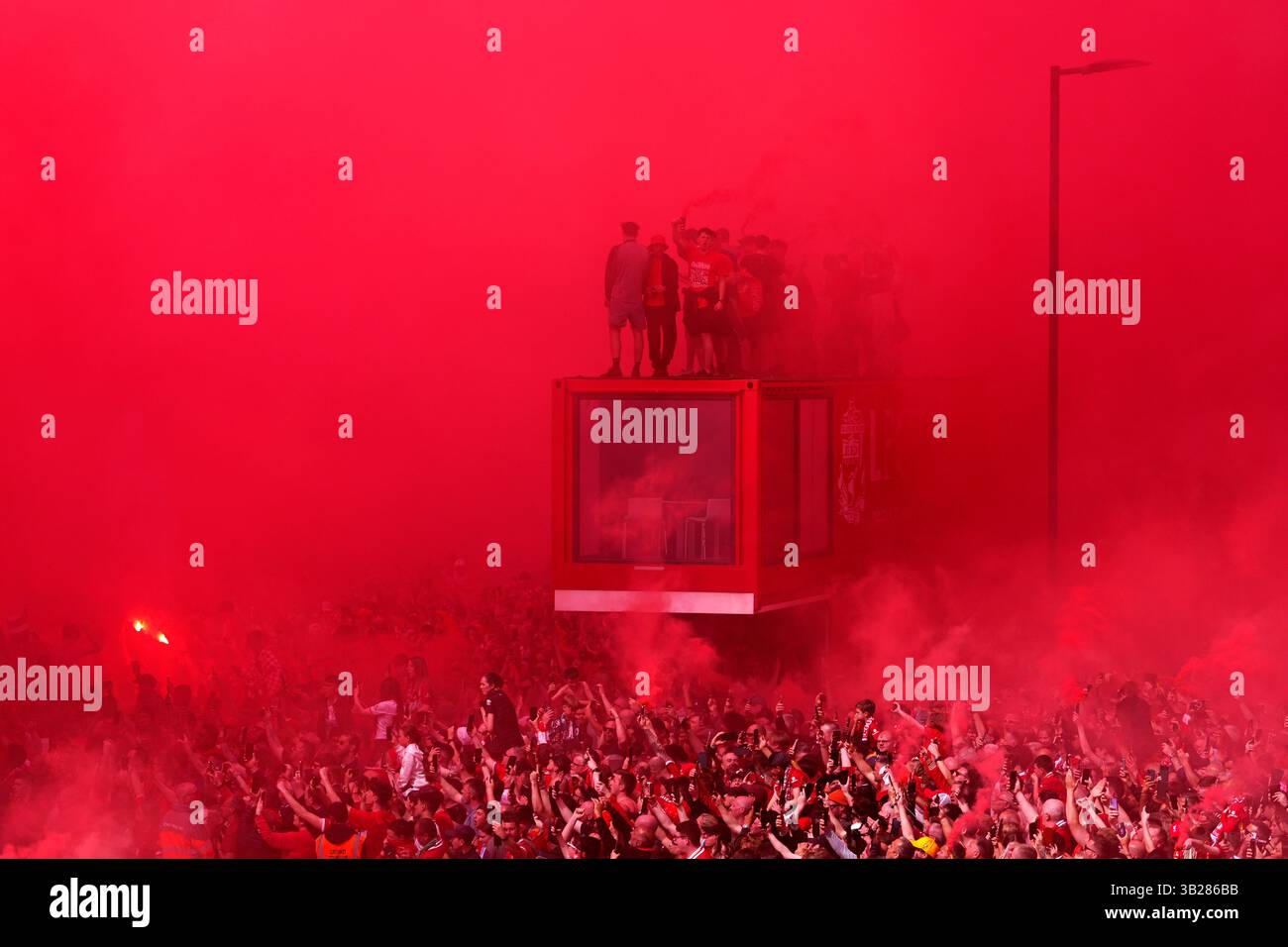 Liverpool fans set off flares outside the stadium ahead of the Premier ...