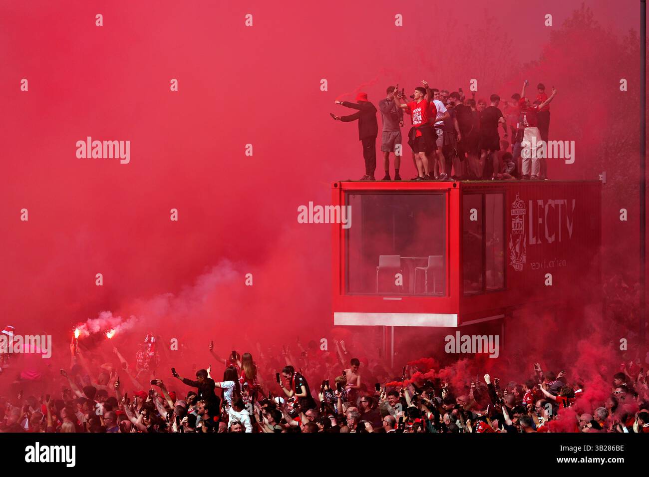 Liverpool fans set off flares outside the stadium ahead of the Premier ...