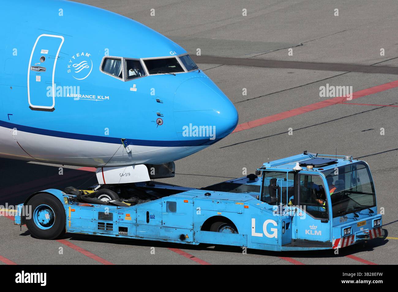 Dutch KLM Boeing 737 on pushback at Amsterdam Airport Schiphol Stock ...
