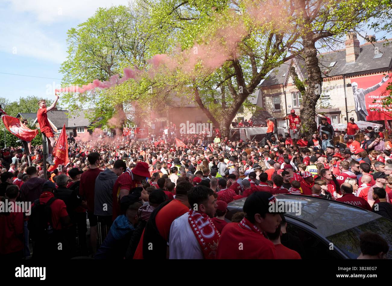 Liverpool fans set off flares outside the ground ahead of the Premier ...