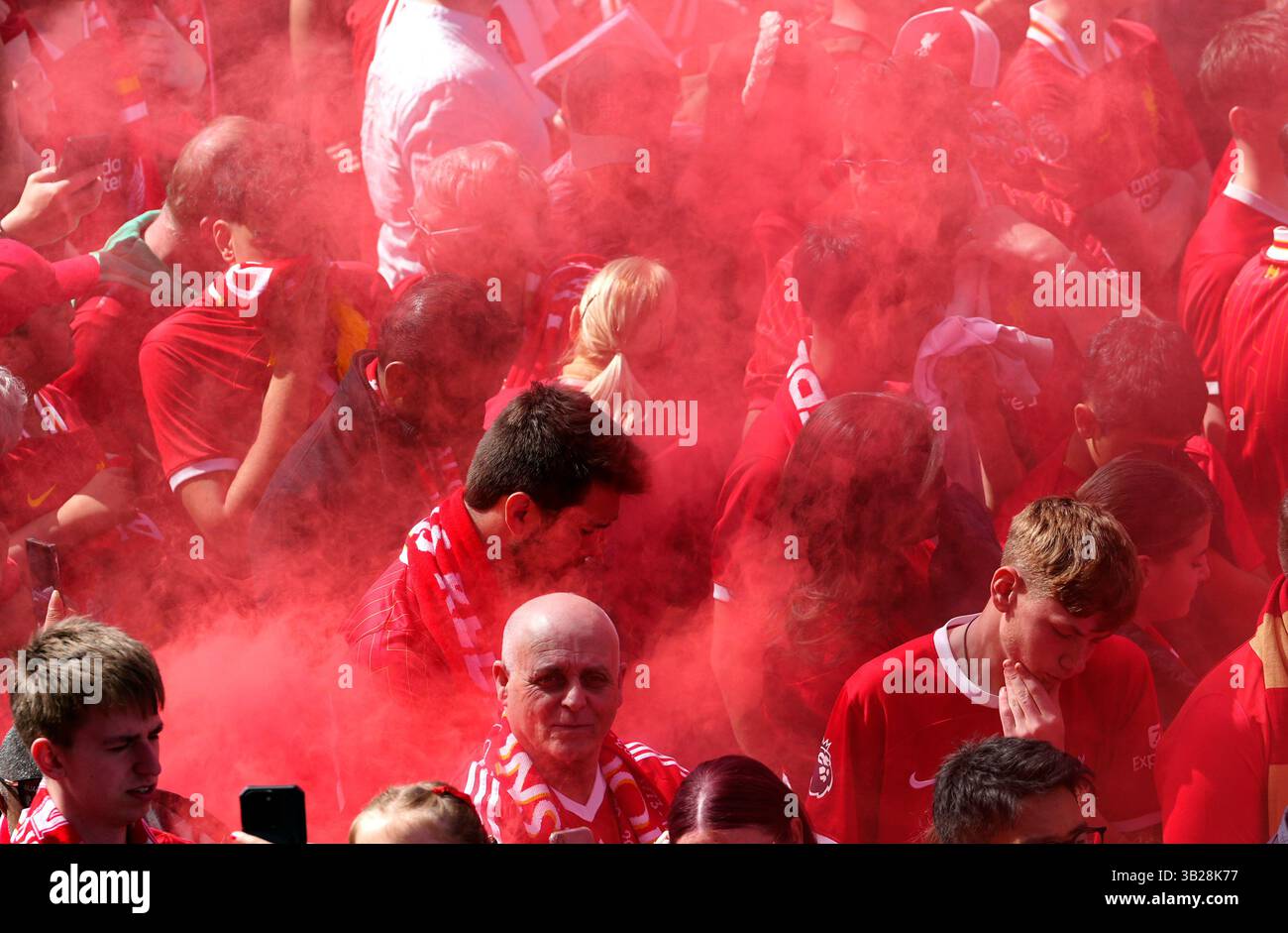 Liverpool fans set off flares outside the stadium ahead of the Premier ...
