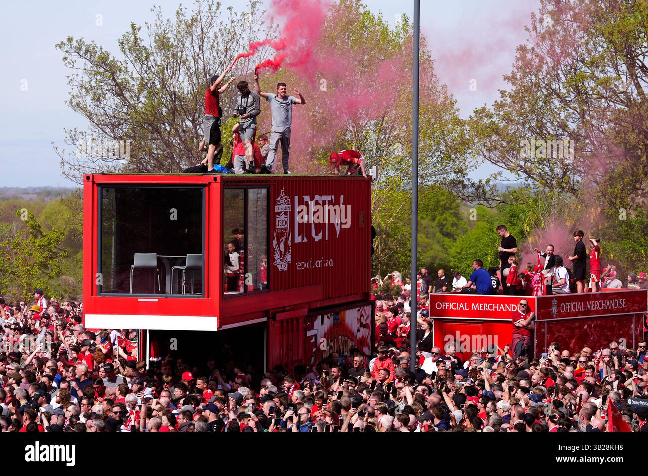Liverpool fans set off flares outside the stadium ahead of the Premier ...