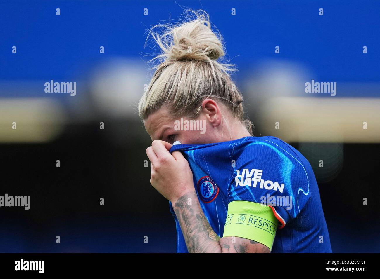 Chelsea's Millie Bright wipes her face during the women's Champions ...
