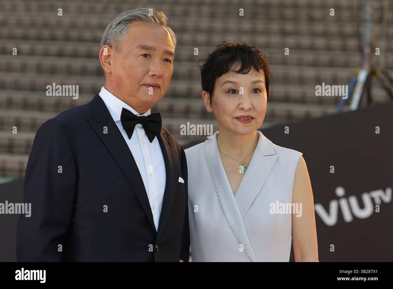Keung Siu-Leung or Jiang Xiaoliang, left and Hon Tung-Ching arrive at ...