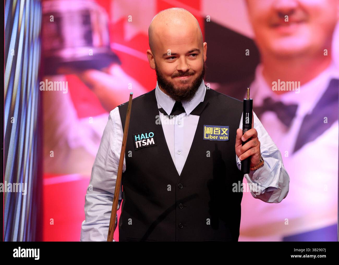 Luca Brecel walks into the crucible before his match against Ding ...