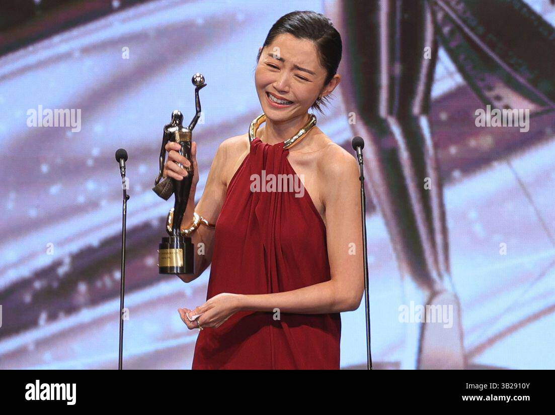 Michelle Wai reacts after receiving the Best Actress award for her role ...