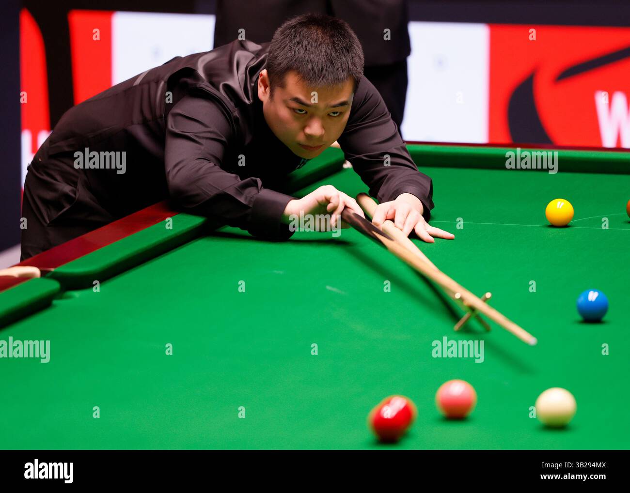 Pang Junxu during his match against Ronnie O'Sullivan (not pictured ...