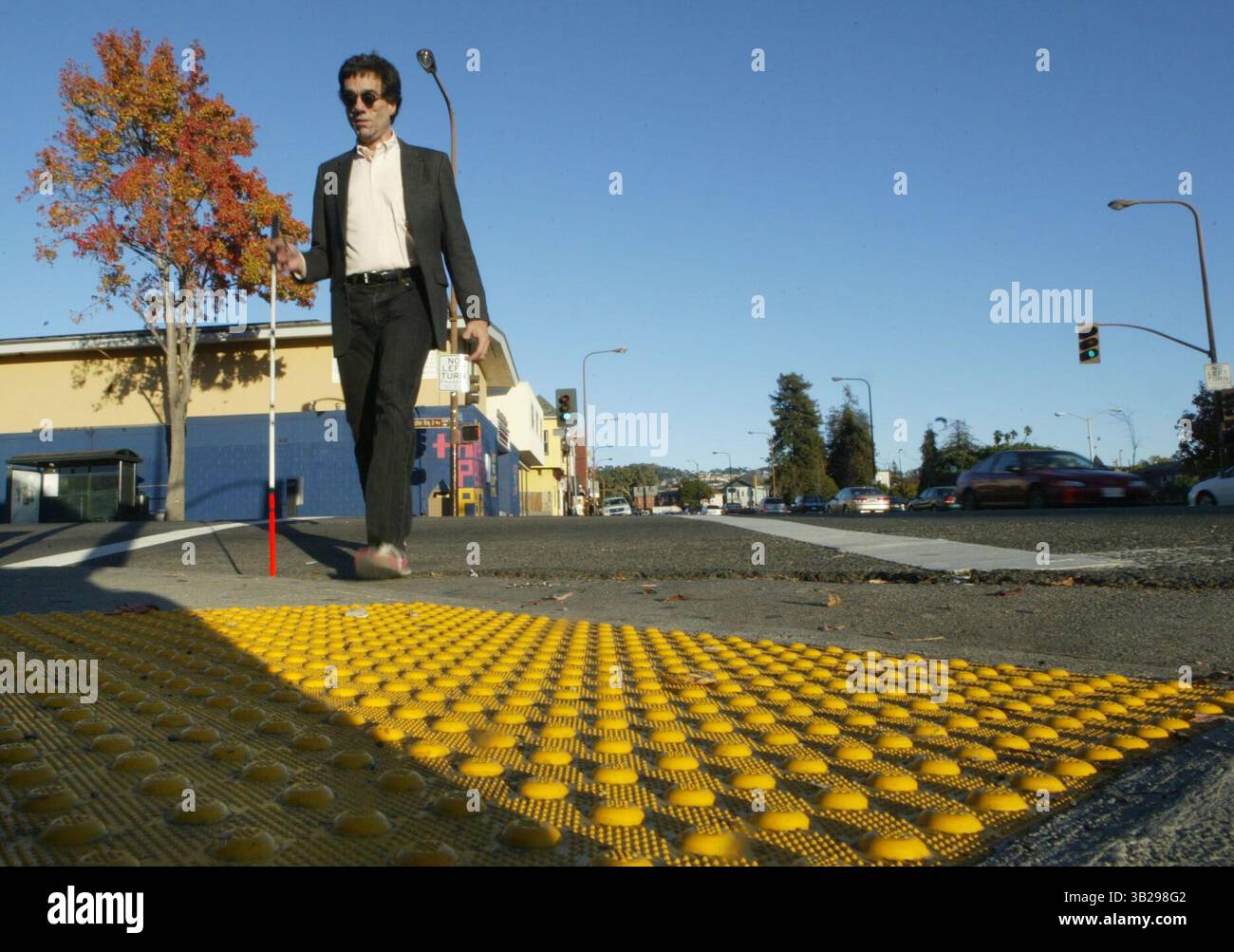 Dmitri Besler walks across Martin Luther King Jr. Way at Ashby in ...