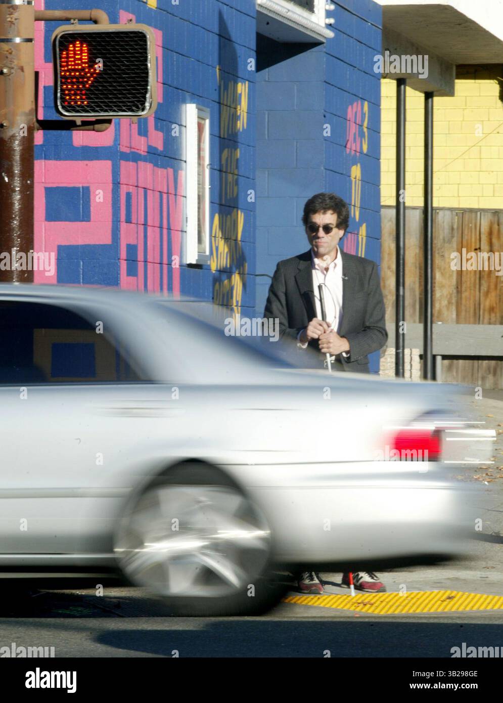 Dmitri Besler waits to cross Martin Luther King Jr. Way at Ashby in ...