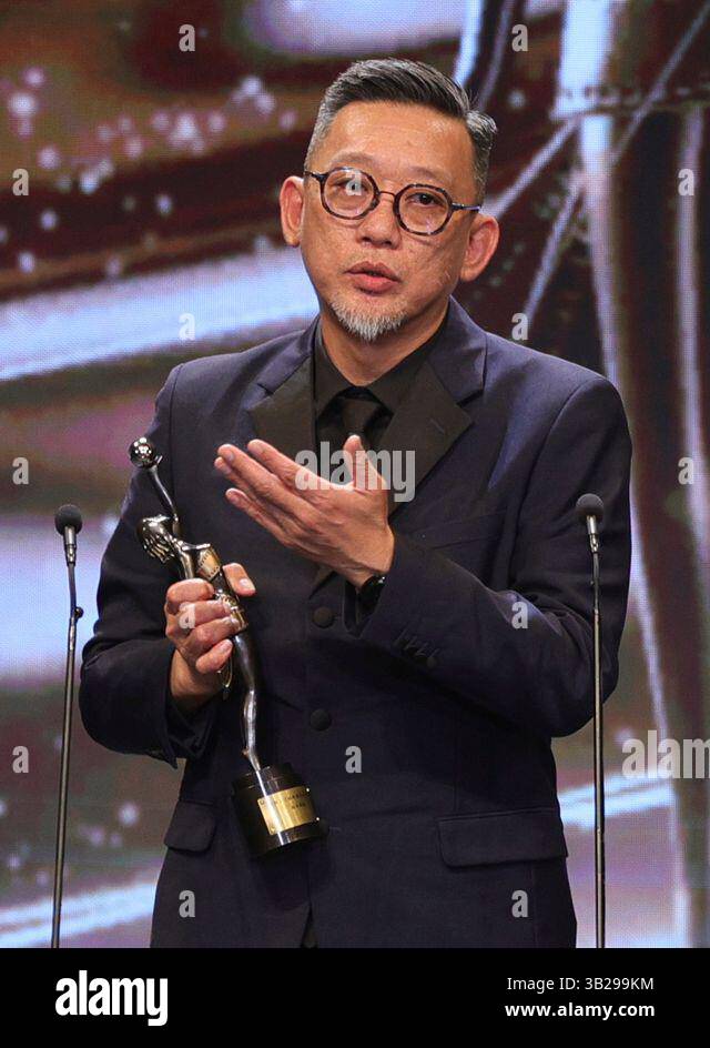 Soi Cheang reacts after being awarded the Best Director award for the ...