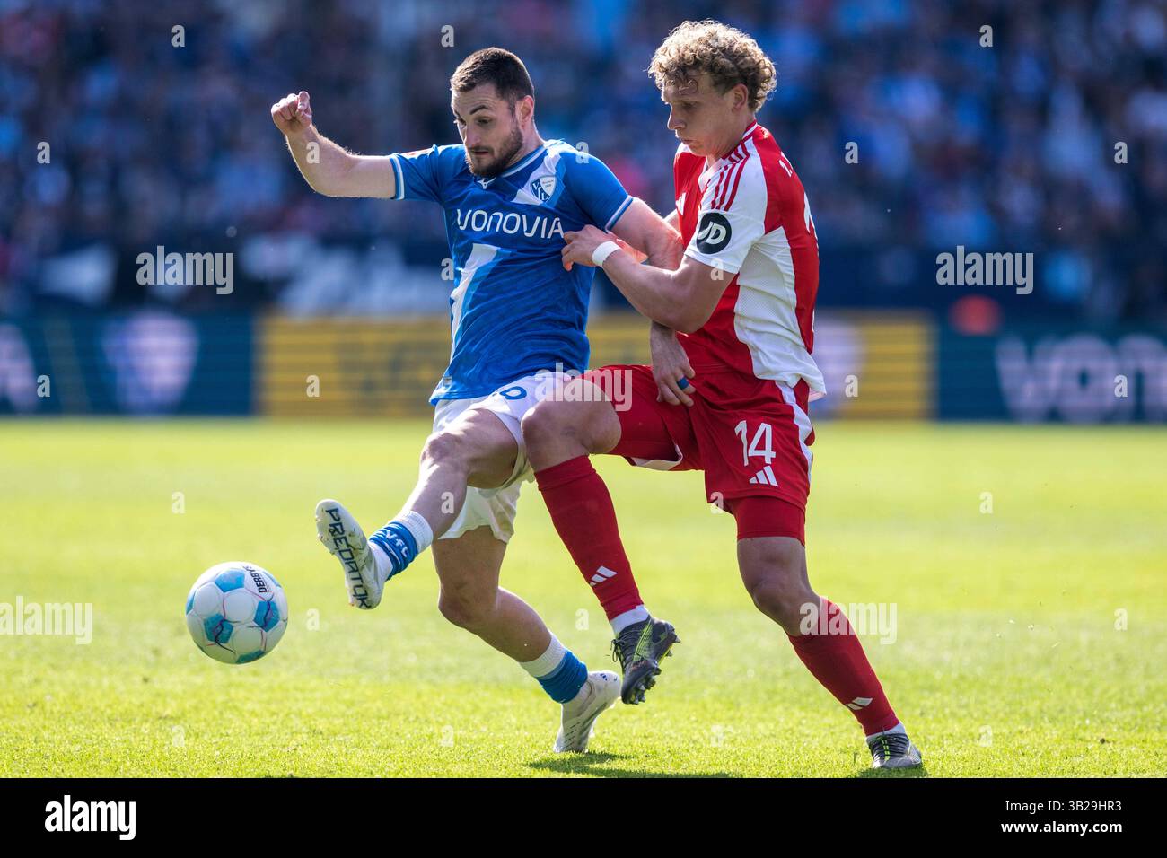Bochum's Matus Bero, left, and Berlin's Leopold Querfeld, right ...