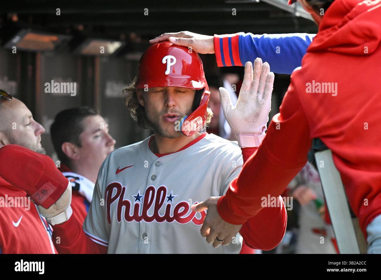 Philadelphia Phillies' Alec Bohm celebrates in the dugout after he ...