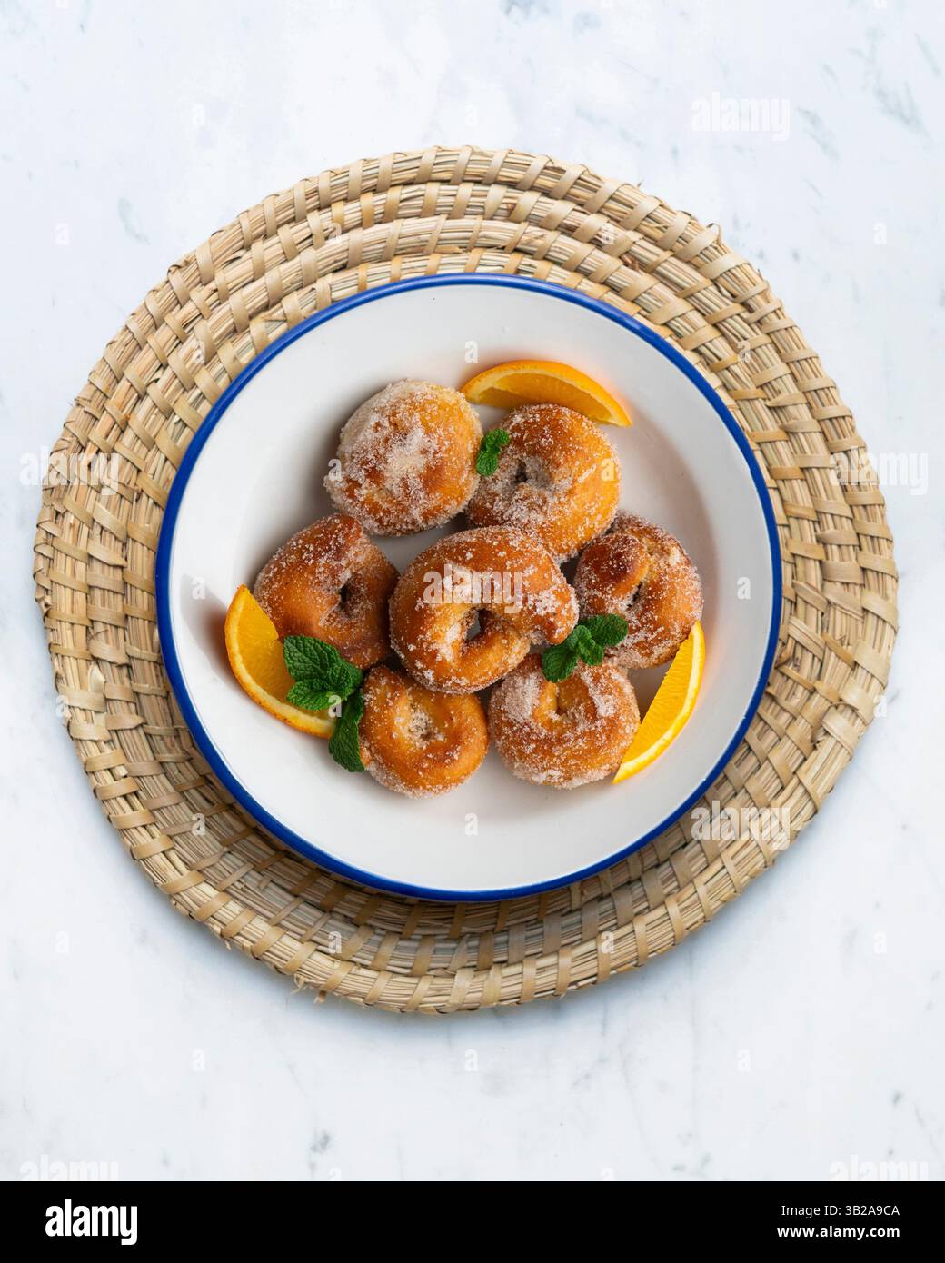 Spanish fried anise doughnuts. Top view table with christmas ...