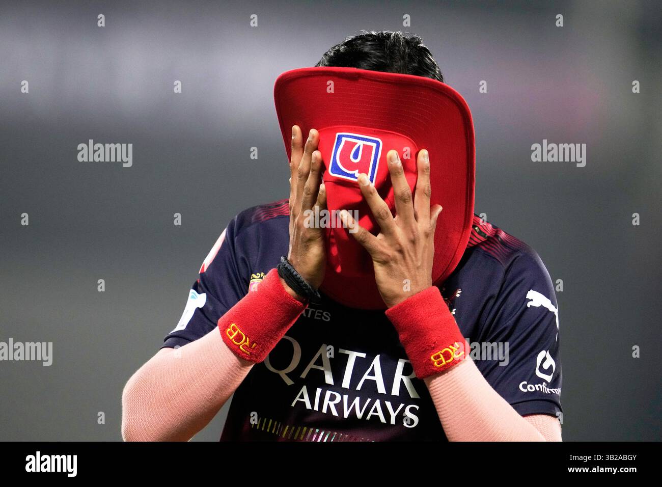 Royal Challengers Bengaluru's Krunal Pandya reacts in the field after a ...