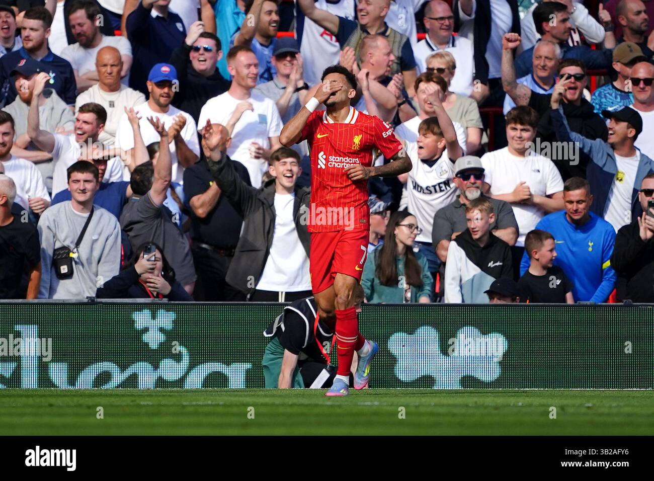 Liverpool's Luis Diaz (centre) reacts after his side's first goal of ...